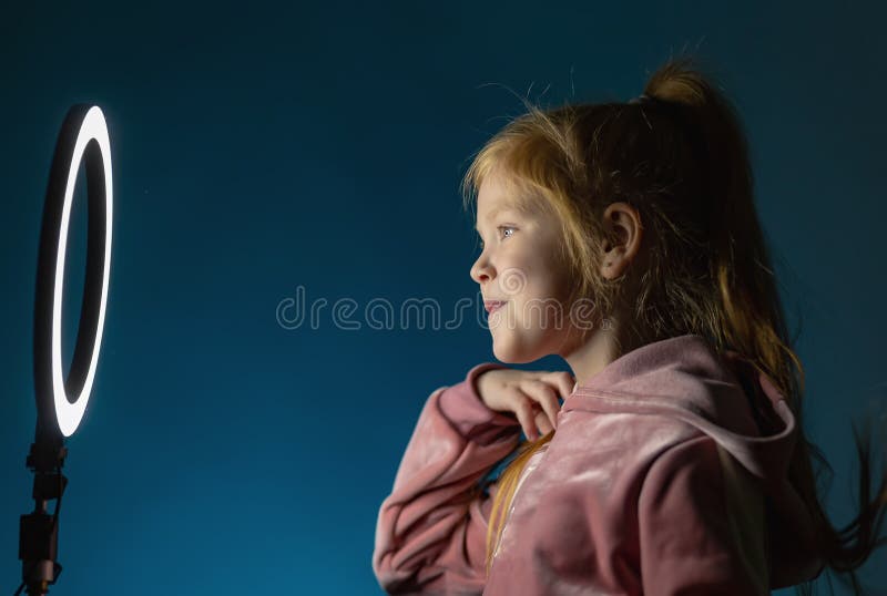 Little Girl in Search of an Image Stock Photo - Image of redhead, game ...