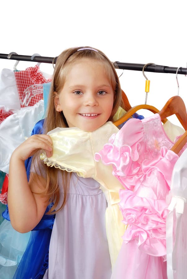 Little Girl in Shop of Dresses. Stock Photo - Image of girl, people ...