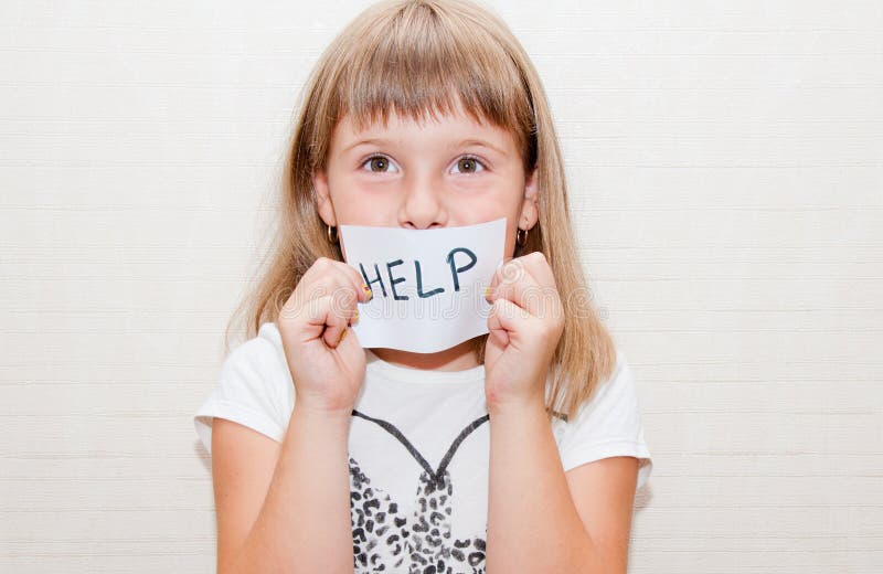 Little girl with sign help stock photo. Image of paper - 43679884