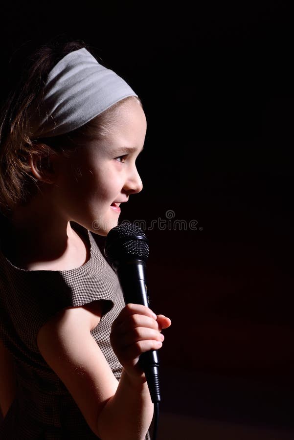 Little girl singing stock image. Image of beautiful, performance - 50772429