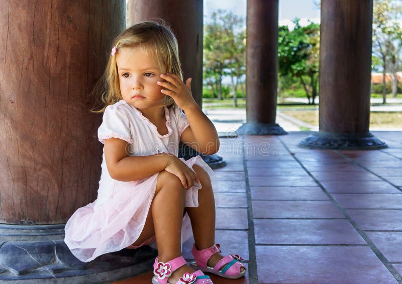 Little Girl Sitting Near the Column Stock Image - Image of pretty ...