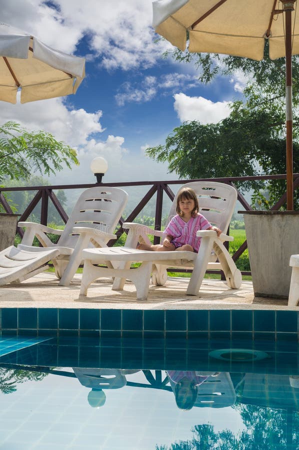Little Girl Sitting Beside The Pool Stock Image - Image of nature ...