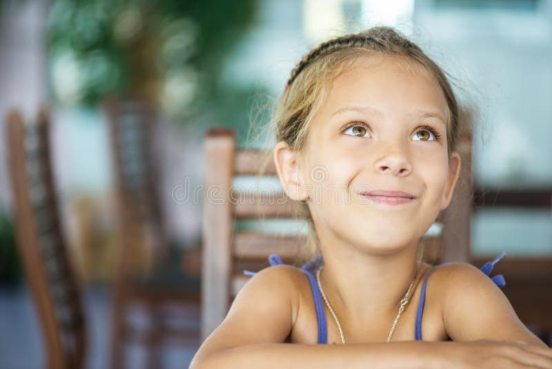 Little Girl Sitting at Table Stock Image - Image of female, hair: 40546391
