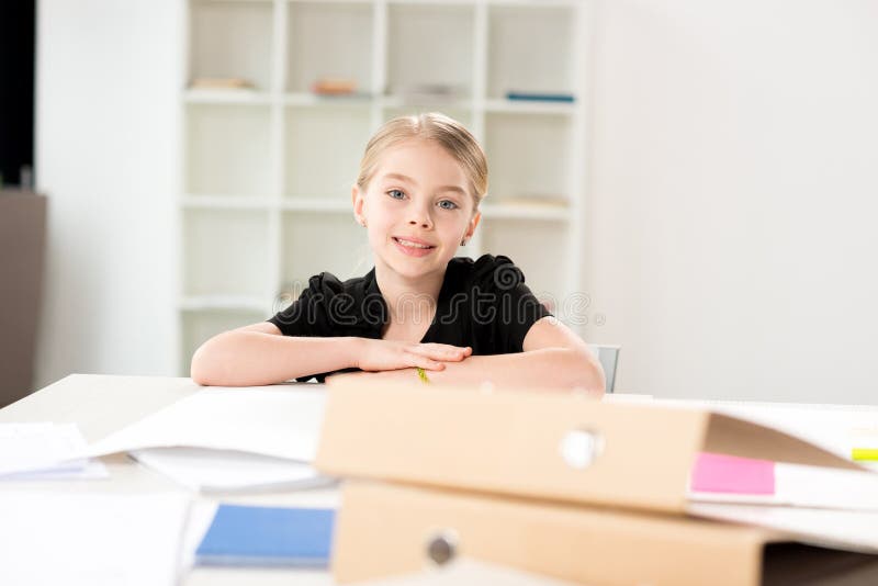 Little Girl Sitting at Table Stock Photo - Image of sitting, table ...