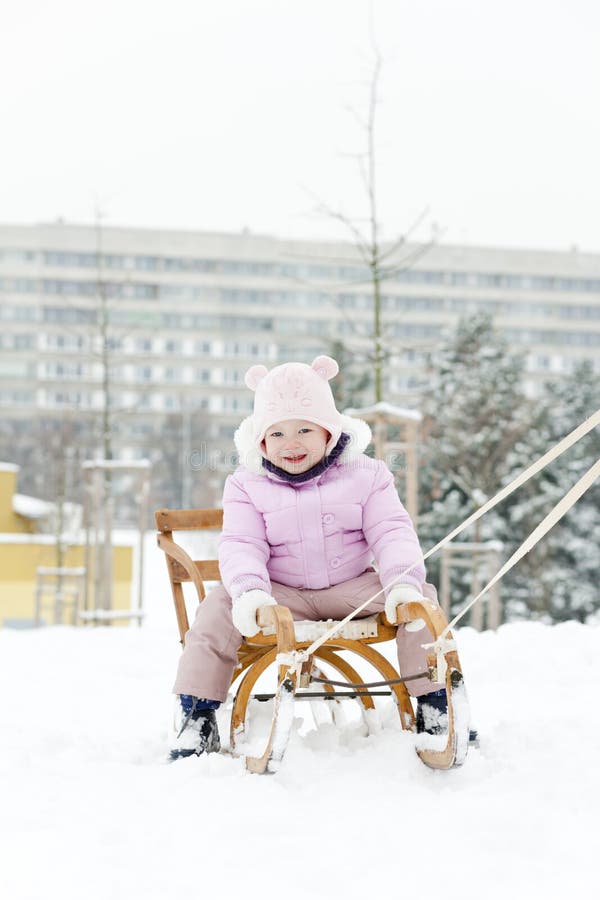 Little Girl Sledding in Snow Stock Image - Image of little, outside ...
