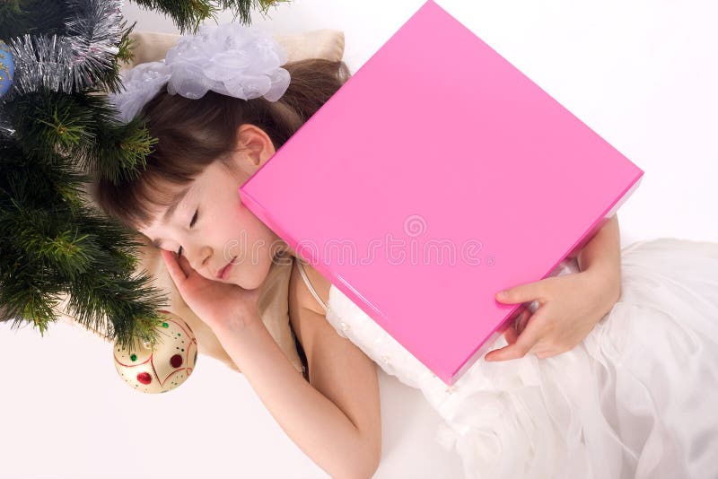 Little Girl Sleeping Under a Christmas Tree Stock Image - Image of ...