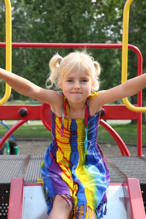 Little Girl on Slide stock photo. Image of children, blond - 2980518