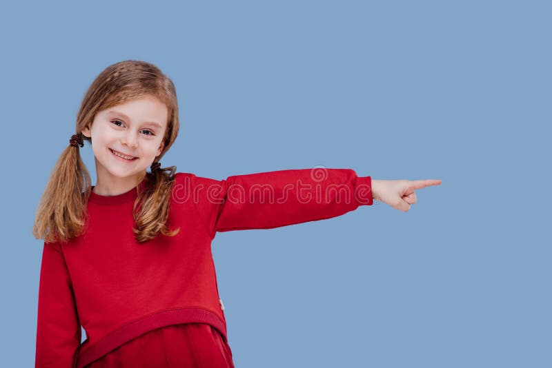Little Girl with Smile Pointing in Left Side Direction Stock Image ...