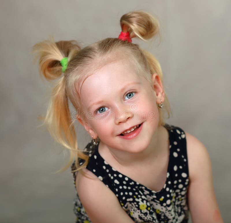 Little Girl Smiling at Camera Stock Photo - Image of healthy, blond ...