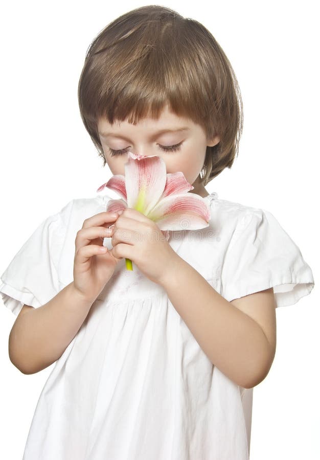 Little Girl Sniffing Lilly Flower Stock Image - Image of child, pleased ...