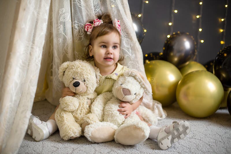 Little Girl with Soft Toys a Bear and a Rabbit. Stock Image - Image of ...