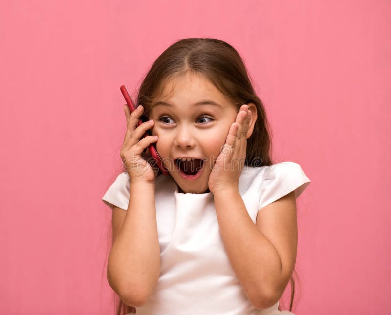 Little Girl Speaks on the Phone. Surprise Stock Photo - Image of ...