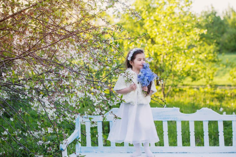 Little Girl in Spring Garden Stock Image - Image of childhood, cherry ...