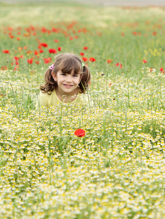 Little Girl on Spring Meadow Stock Image - Image of girl, field: 40799243
