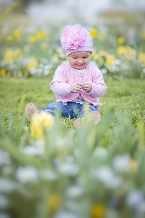 Little girl in spring park stock photo. Image of face - 30864040