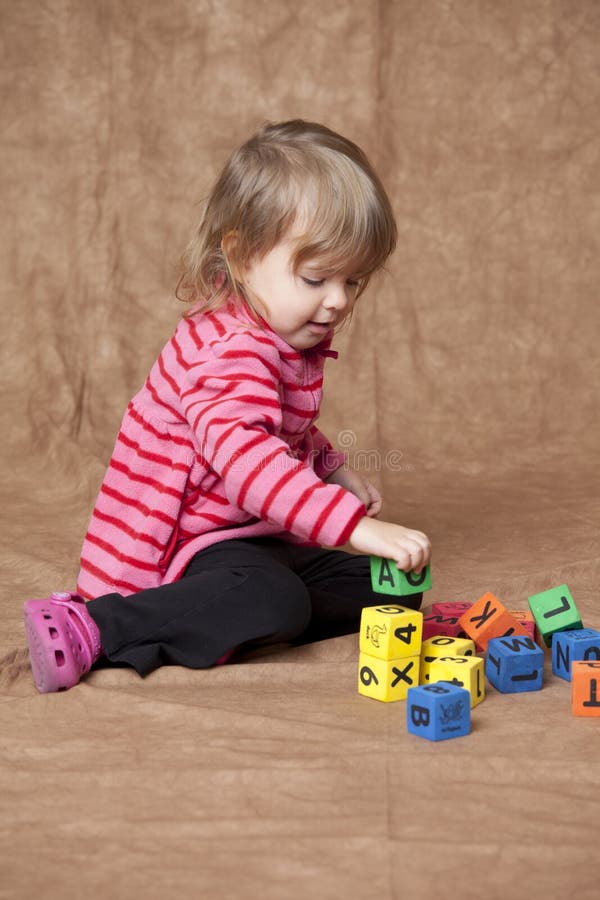 Little Girl Stacking Blocks Stock Image - Image of baby, childhood ...