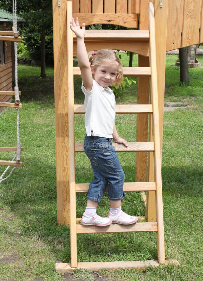 Little Girl Standing on Ladder Stock Image - Image of female, youth ...