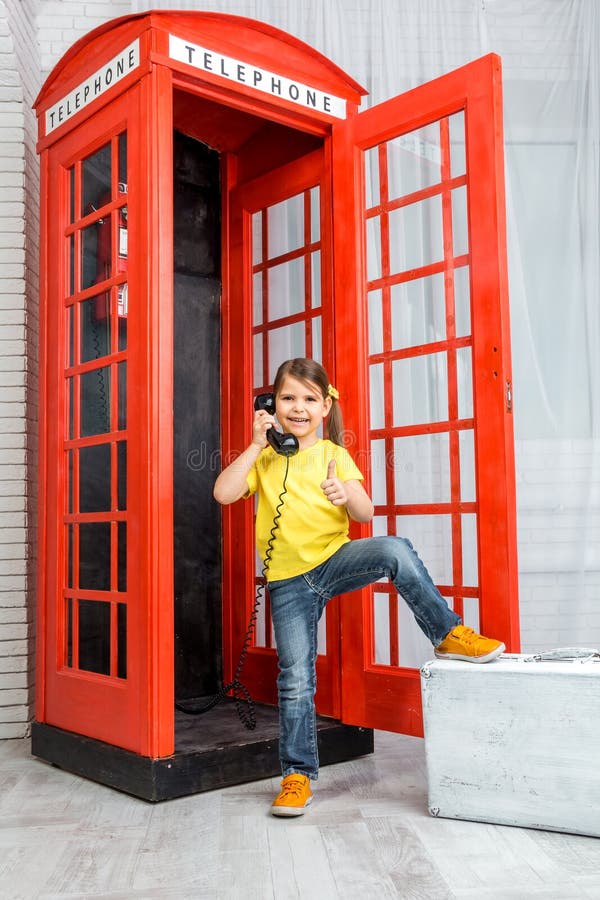 Little Girl Standing at a Phone Booth Stock Photo - Image of marsala ...