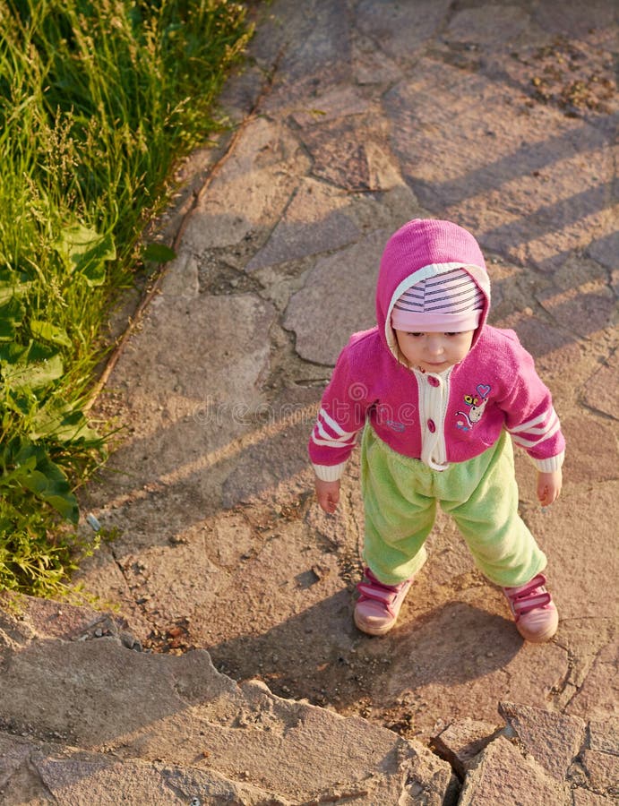 Little Girl Standing on a Stone Path Stock Image - Image of trekking ...