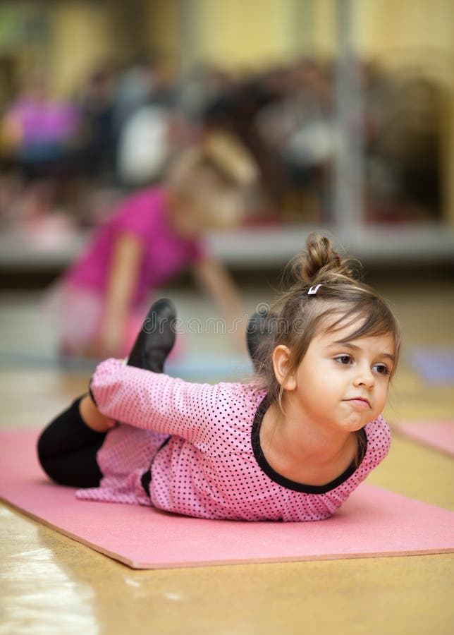 Little girl stretching stock photo. Image of floor, human - 28095434