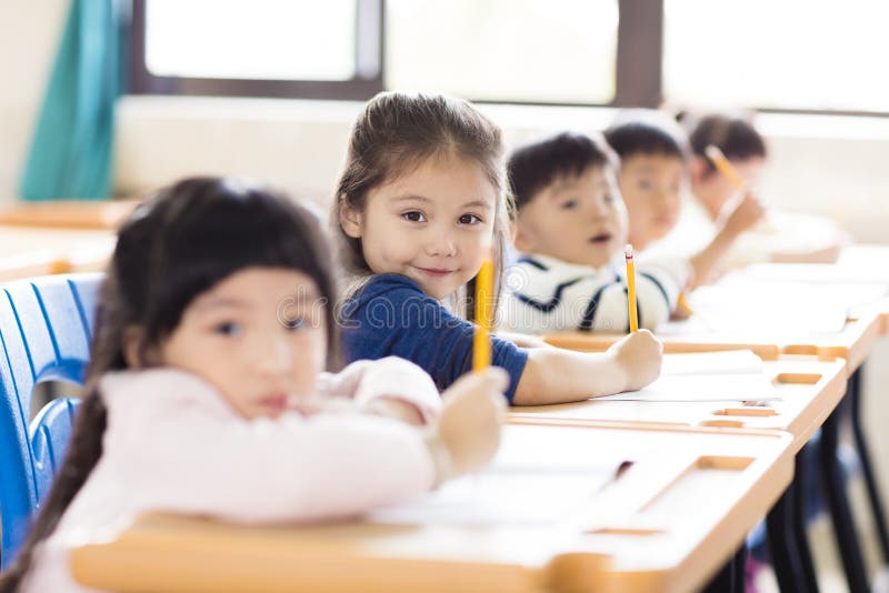 Little Girl Student in the Classroom Stock Image - Image of childhood ...