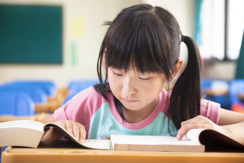 Little Girl Study Alone in the Classroom Stock Image - Image of ...