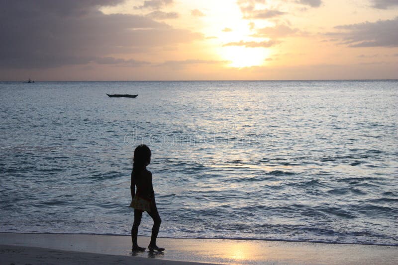 Little girl and sunset stock photo. Image of calm, gold - 35278720