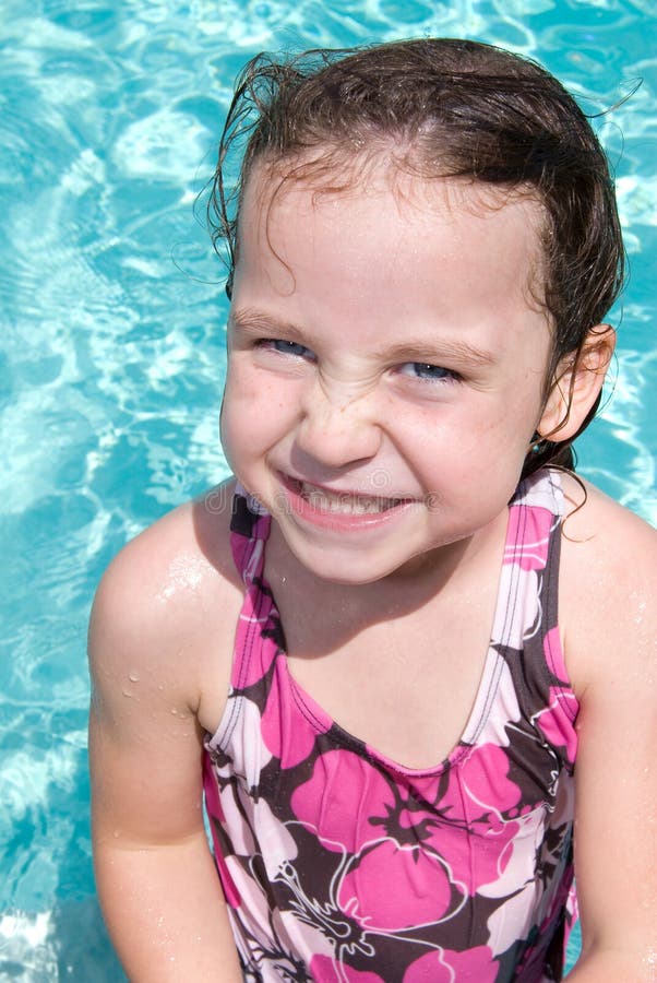 Little Girl in Swimming Pool. Stock Image - Image of smiling ...