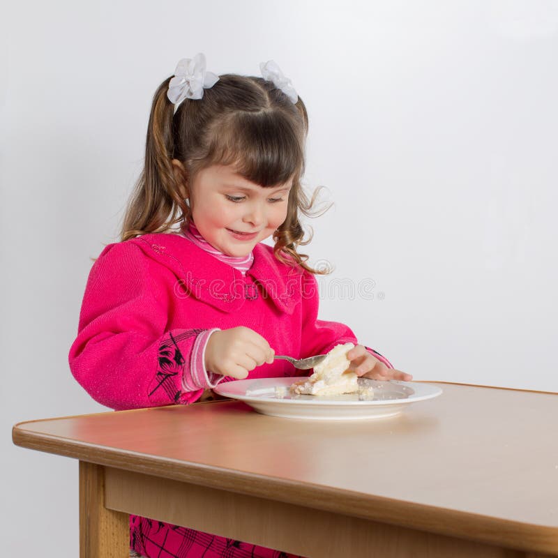 Little girl at the table stock image. Image of little - 50690863