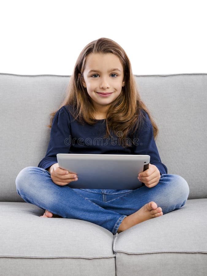 Little girl with a tablet stock image. Image of casual - 85343685