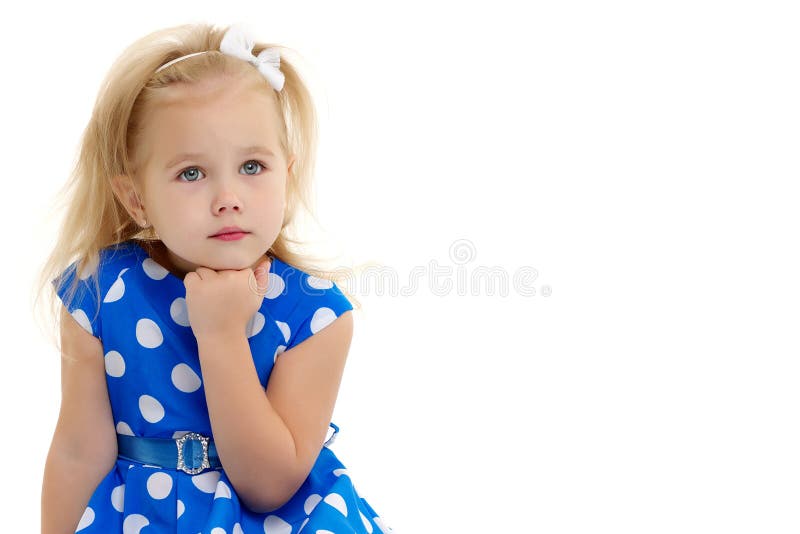 The Little Girl Thinks.Isolated on White Background. Imagen de archivo ...