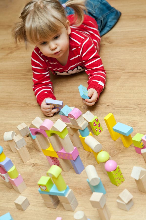 Little Girl with Toy Blocks Stock Photo - Image of lies, educative ...