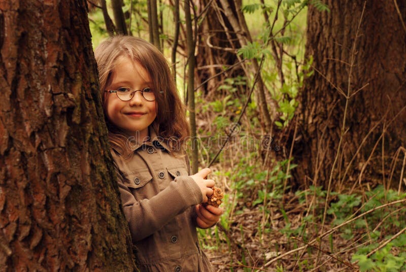 Little girl and a tree stock image. Image of spring, play - 5153025