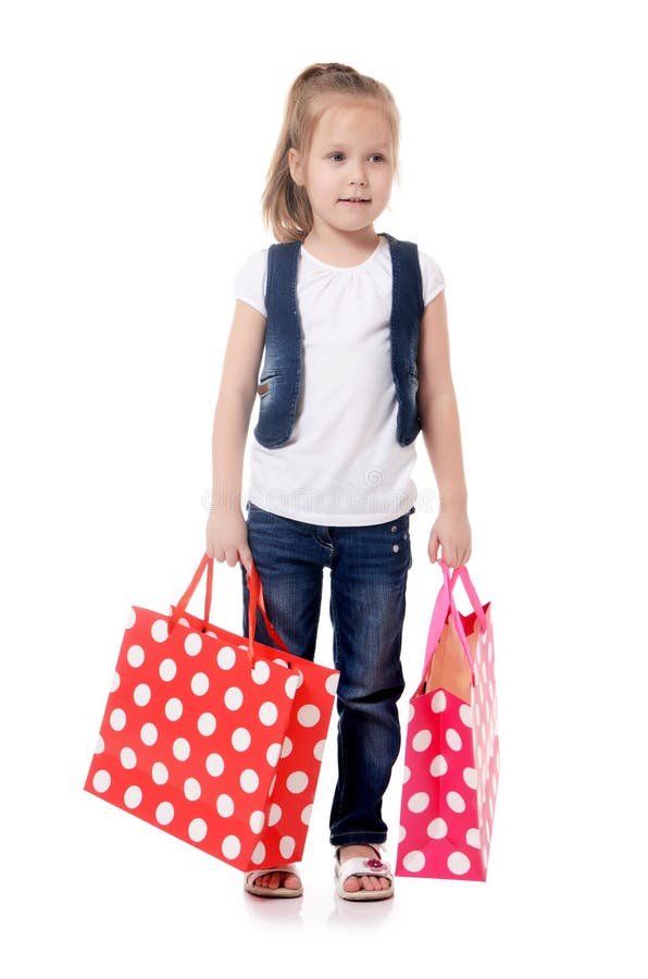 The Little Girl with Two Packages Isolated Stock Image - Image of ...