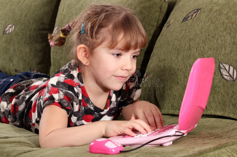 Little Girl Typing on Laptop Stock Photo - Image of beauty, child: 23041788