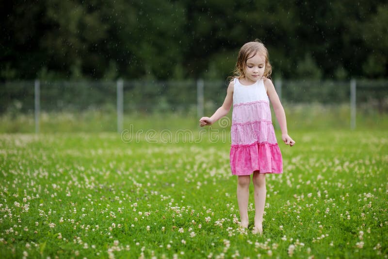 Little girl under the rain stock image. Image of adorable - 26138939