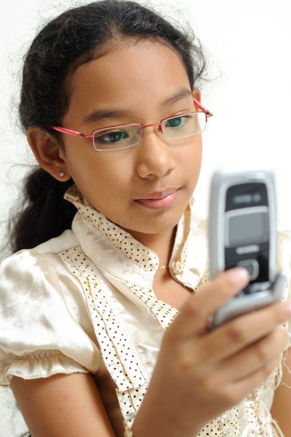 Little girl use handphone stock photo. Image of beautiful - 7590848