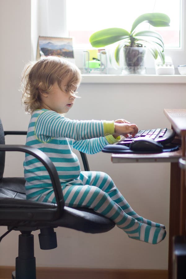 Little Girl Using Computer stock photo. Image of little - 119108686