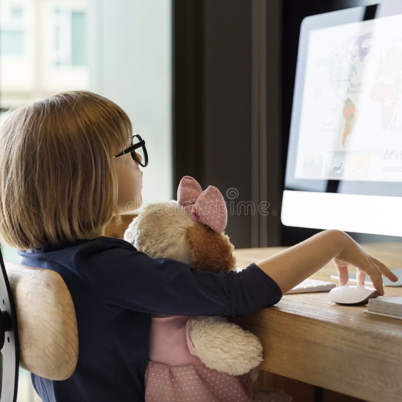 Little Girl Using Computer Concept Stock Photo - Image of girl, happy ...
