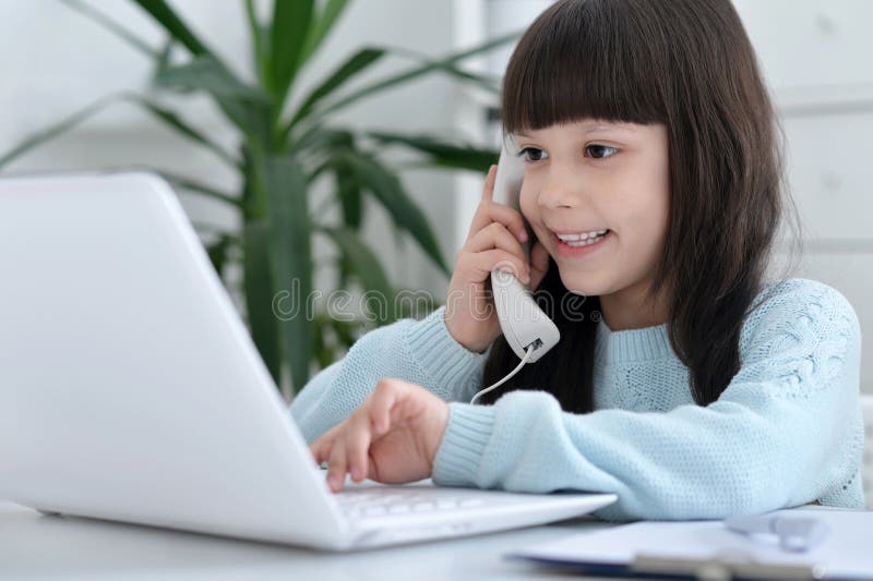 Little girl using computer stock photo. Image of family - 74814198