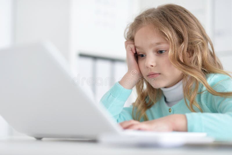 Little girl using computer stock photo. Image of education - 72444156