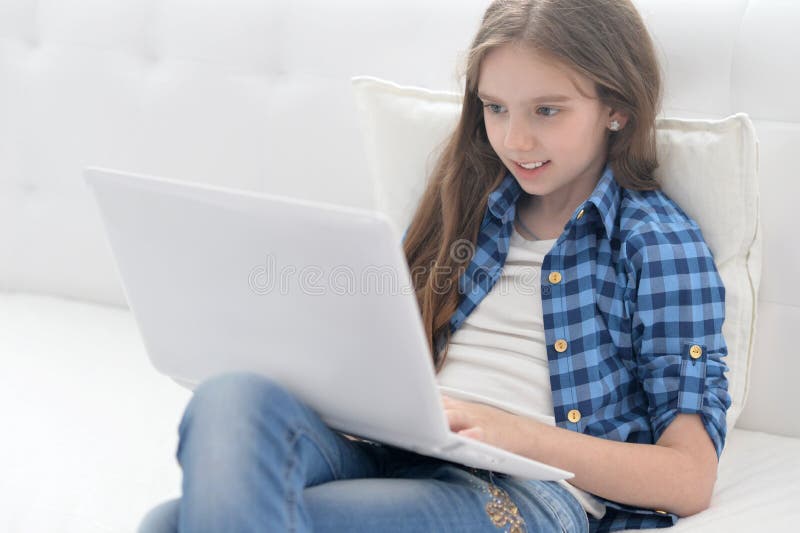 Little girl using computer stock photo. Image of playing - 72440318