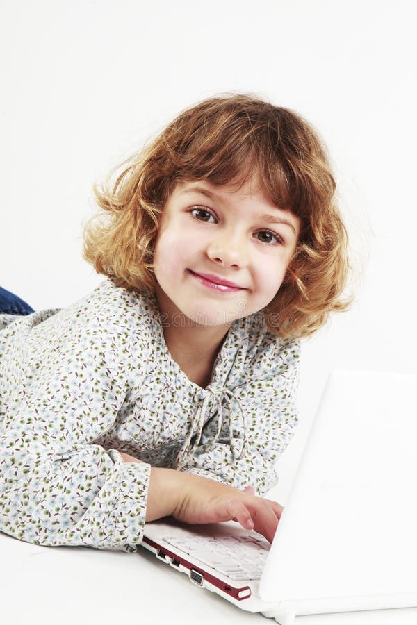 Little girl using laptop stock image. Image of preschool - 31467235