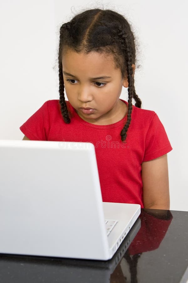 Young Girl Doing Her Homework on a Laptop Stock Image - Image of camera ...