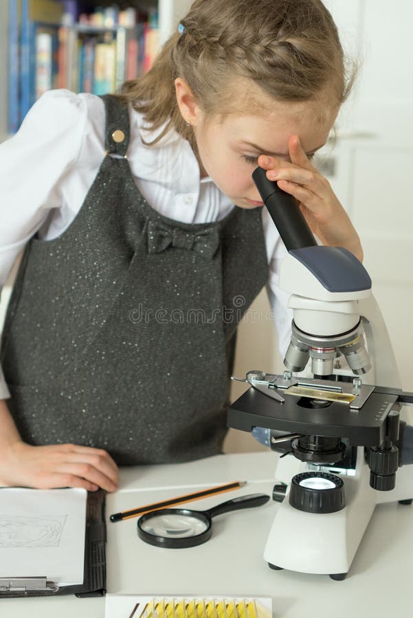 Little Girl Using Microscope. Stock Image - Image of desk, equipment ...