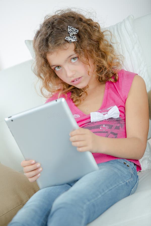 Little Girl Using New Tablet Computer Stock Photo - Image of pretty ...