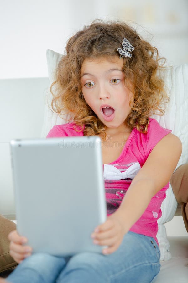 Little Girl Using Tablet Computer Stock Image - Image of screen ...