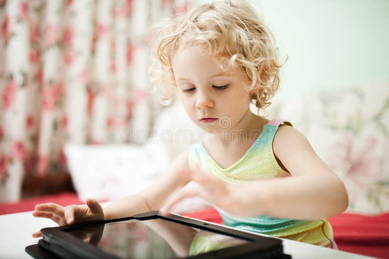 Little Girl Using Tablet Computer Stock Image - Image of female, home ...