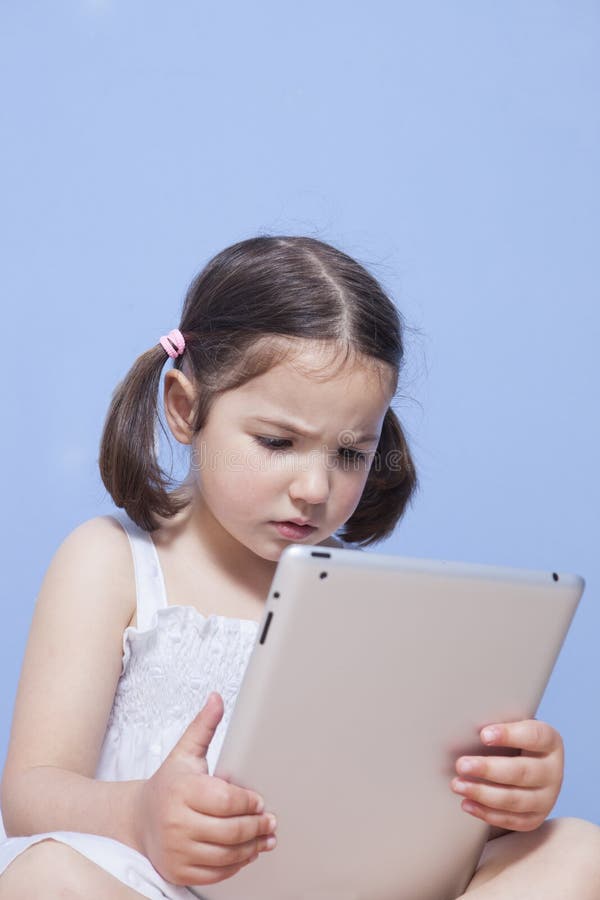 Little Girl Using Tablet Computer Stock Image - Image of adorable ...