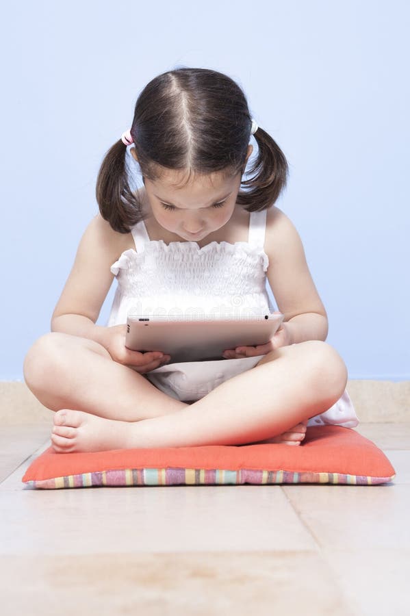 Little Girl Using Tablet Computer Stock Photo - Image of development ...